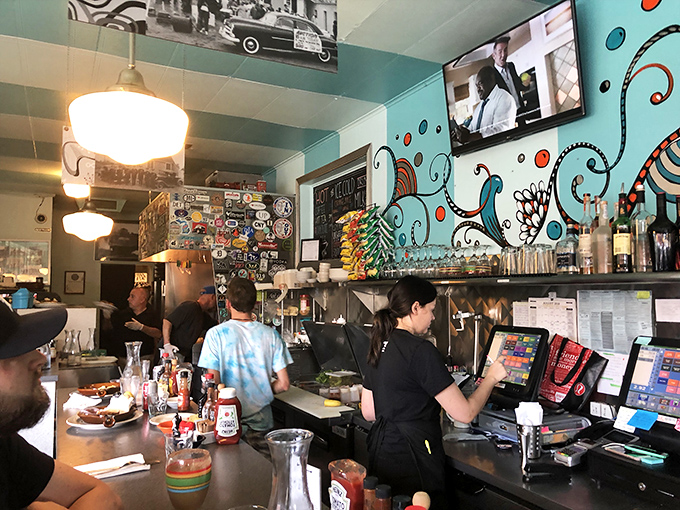 Behind this counter, breakfast magicians transform simple ingredients into morning masterpieces while you watch the show from the best seats in the house.