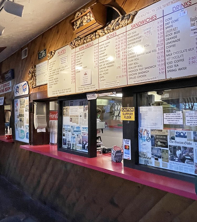 The order counter&mdash;where dreams are placed and seafood magic begins. Notice how nobody's checking their phones? That's anticipation.