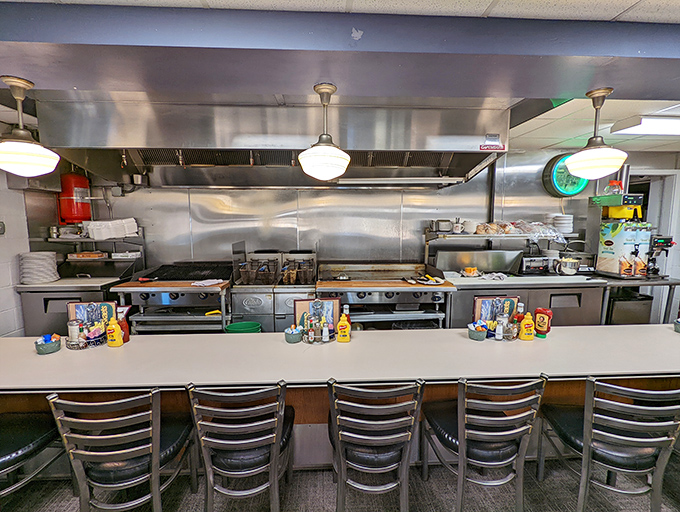 The open kitchen counter&mdash;where culinary theater happens daily. Front-row seats to the sizzle and flip show that's been running for decades.