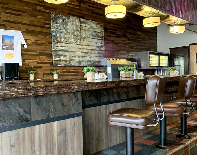 Reclaimed wood and warm lighting create a counter experience that invites you to sit, stay awhile, and maybe order that second cup of coffee.
