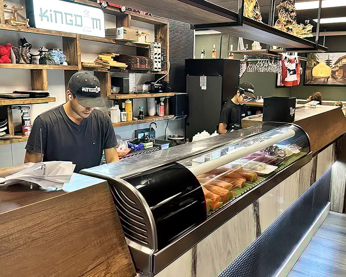 Behind the counter, fresh fish awaits transformation &ndash; like watching backstage at a delicious Broadway production.
