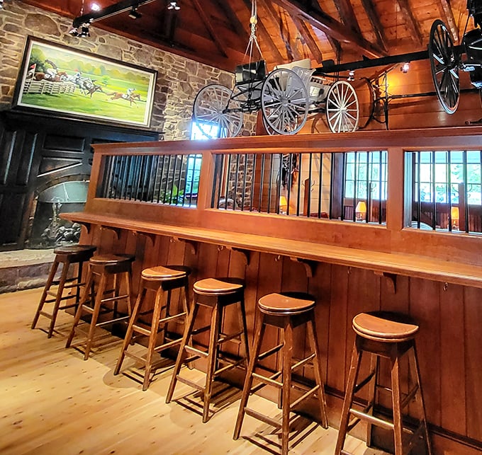 Where rustic meets refined&mdash;a bar that invites you to saddle up and stay awhile. Note the carriage wheels above&mdash;transportation then and now.