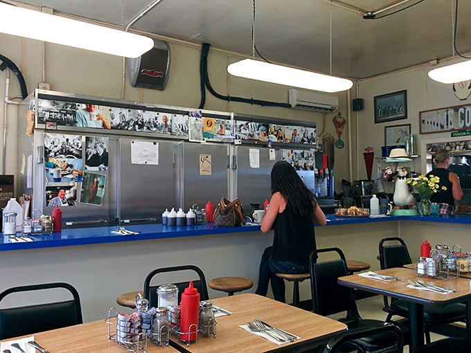 Photos on the wall and condiments on the counter tell stories of decades of satisfied customers and countless refilled coffee cups.