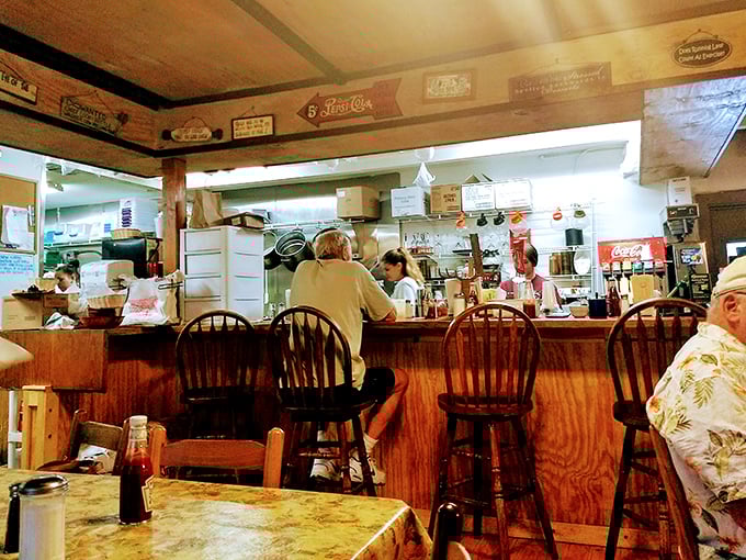 The counter seats&mdash;where regulars become family and the kitchen's symphony plays out before your eyes. Front-row tickets to breakfast theater.