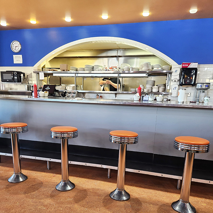 The counter seats offer front-row tickets to the breakfast theater – where short-order cooks perform their morning ballet of spatulas and plates.