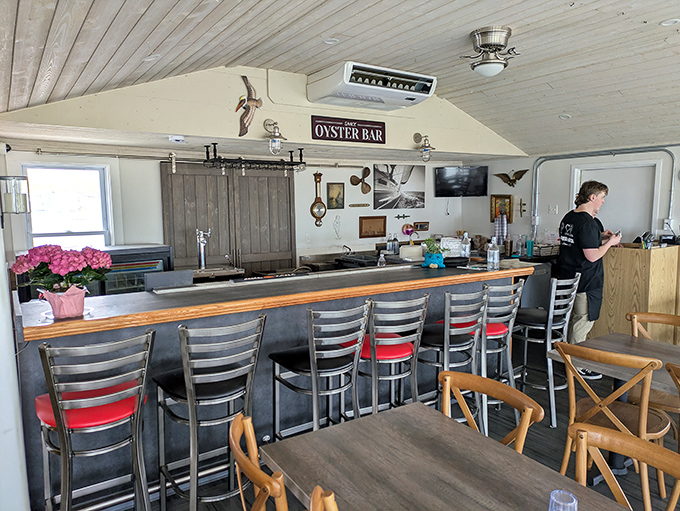The oyster bar—where seafood dreams come true and strangers become friends united by the universal language of "Oh my god, you have to try this."