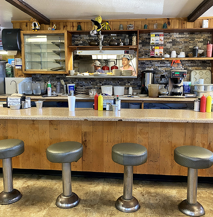 Counter seating: where solo diners become part of the Beeline family and the coffee refills come with a side of local wisdom.