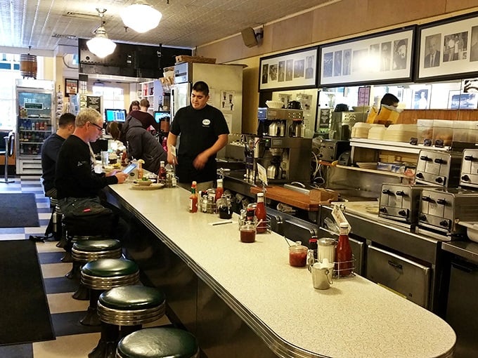 The counter seating&mdash;where solo diners become temporary family and the coffee refills flow like conversation. Some of life's best moments happen on these stools.