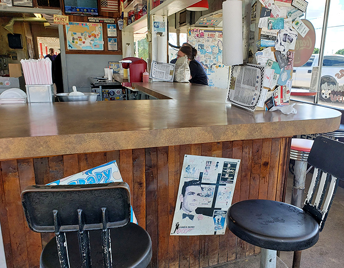 The counter where regulars have their "usual" and newcomers become converts. Notice the vintage memorabilia—each piece with its own story.