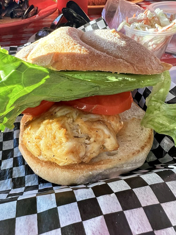 The sandwich that launched a thousand road trips. This crab cake on a bun proves that sometimes the simplest delivery systems are the best.