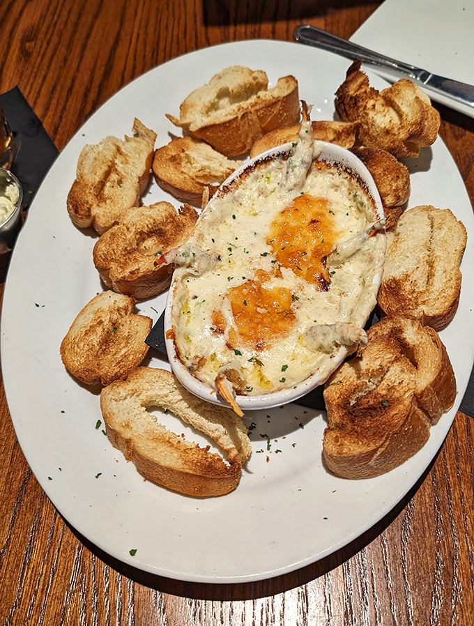 Bubbling hot crab dip surrounded by toasted bread &ndash; the kind of appetizer that makes the table fall silent except for appreciative murmurs.