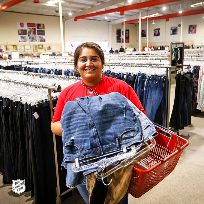Thrift shopping victory looks like this &ndash; arms full of denim treasures and the smile of someone who just outsmarted retail pricing.