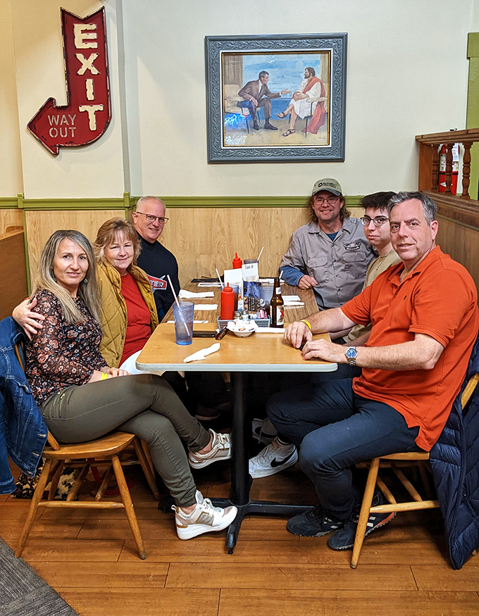 Happy diners gathered around the table&mdash;the universal portrait of what restaurants are really all about.