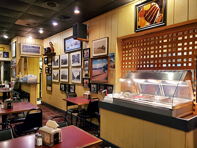 The photo gallery wall &ndash; a visual history of Salina's love affair with properly smoked meat and the people who make it happen. 