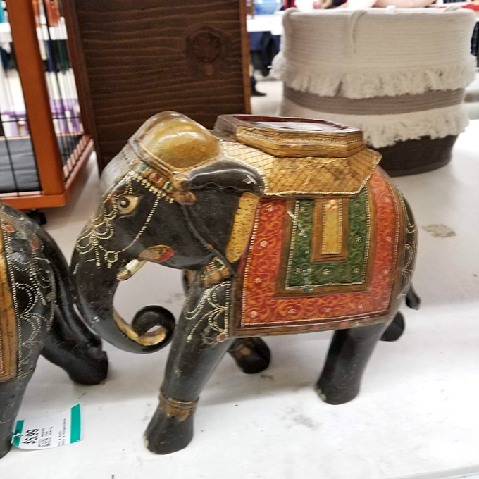 This ornate elephant figurine brings exotic charm to any shelf. Someone's former tchotchke, your future conversation starter.
