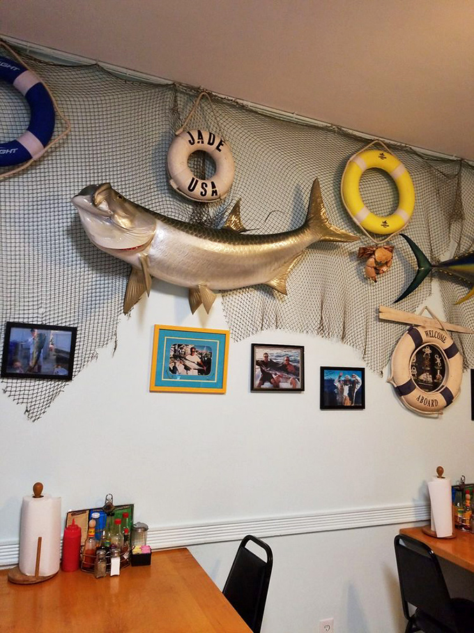 That life preserver on the wall? It's for when you're drowning in seafood options. Every inch of decor tells a story of Florida's maritime heritage.