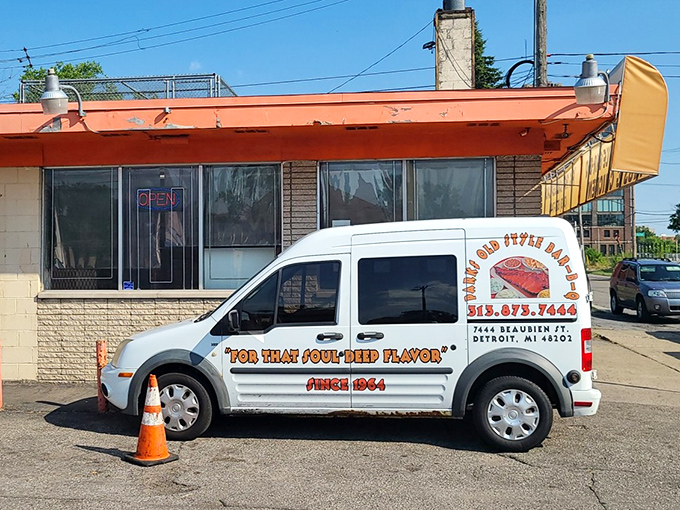 The delivery vehicle proudly proclaims "For That Soul-Fed Flavor" &ndash; because in Detroit, good barbecue isn't just food, it's spiritual nourishment.