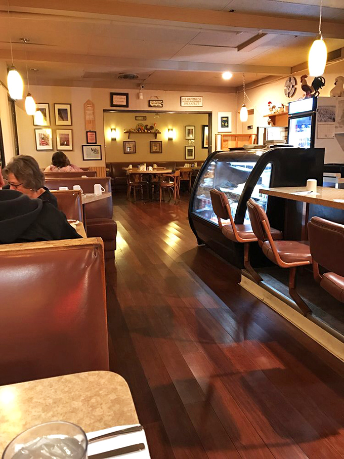 Warm wood tones and pendant lights create that golden-hour glow all day long&mdash;making every meal feel like a scene from an Edward Hopper painting.