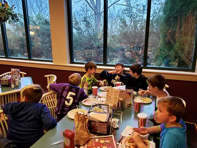 Where future food critics are born. Nothing says "family tradition" like watching kids discover the joy of pizza while plotting to steal each other's crusts.