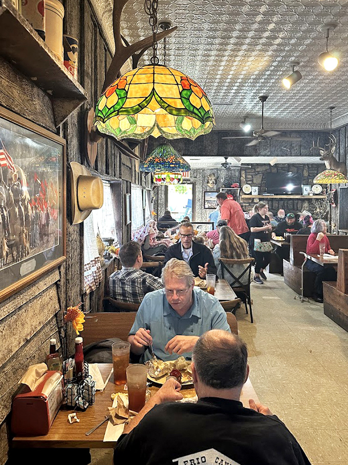 The dining room buzzes with conversation as colorful Tiffany-style lamps illuminate plates of food that would make any grandmother proud.