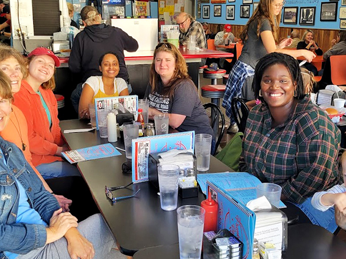 Where strangers become regulars and regulars become family—the true magic of a small-town diner happens around these tables.
