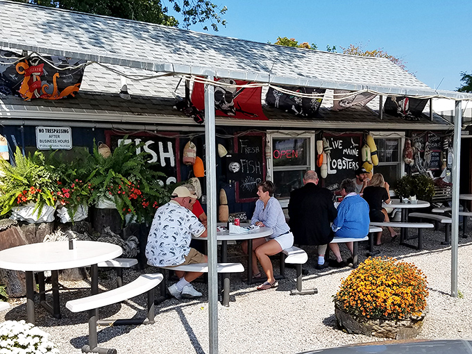 The outdoor dining area&mdash;where strangers become friends united by the universal language of "Did you try the lobster roll?"
