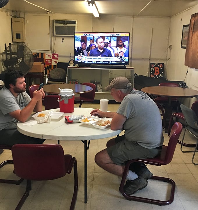 Real barbecue brings people together. These diners know they've found something worth putting their phones down for.