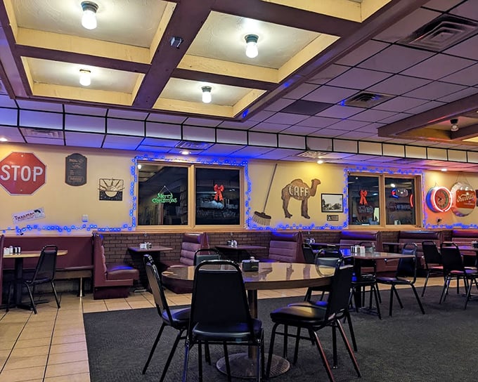 Evening ambiance with neon lights and cozy booths creates the perfect backdrop for late-night conversations. Some of life's best decisions happen over diner coffee.