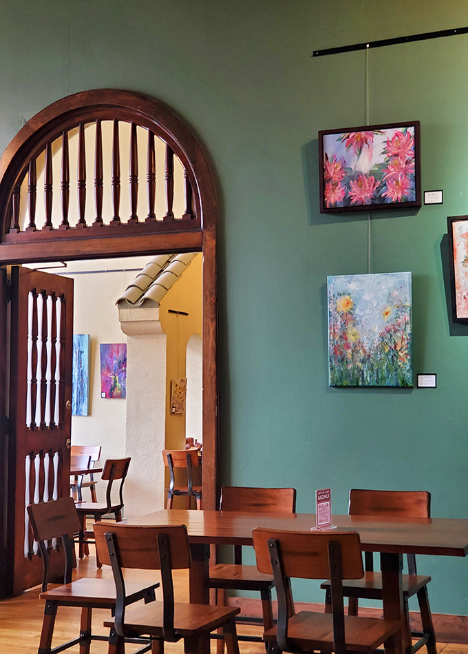 Archways and artwork create dining nooks that feel like you're eating in someone's particularly stylish living room. Comfort food deserves comfortable surroundings.