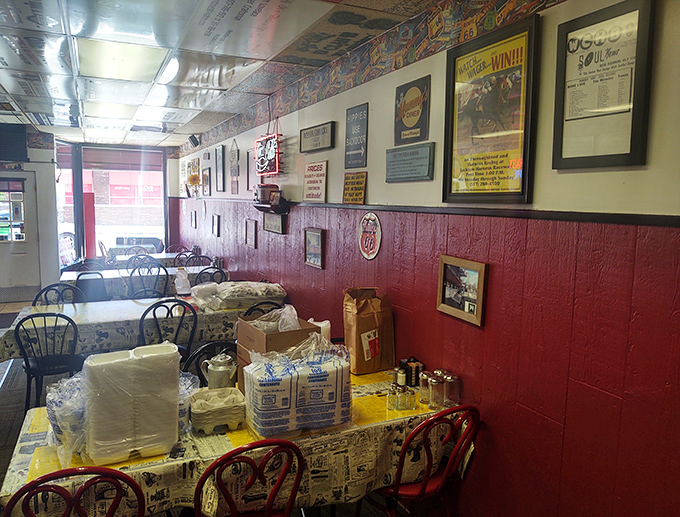 Red booths and collected memories create the perfect backdrop for life's most important meal. 