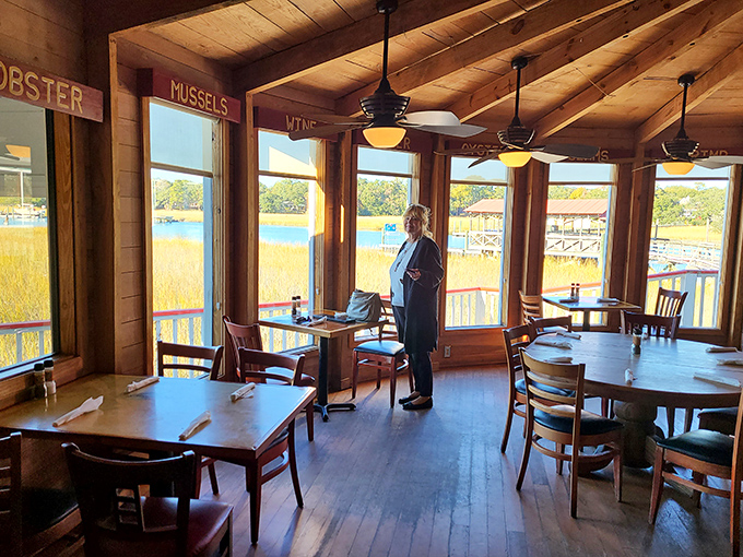 Sunlight streams through windows framing the marshland beyond &ndash; dining rooms with views like this should charge admission.