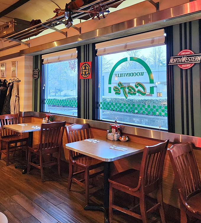 Window seats that frame Woodinville like a postcard. Those railroad signs remind you that good food has always been worth the journey.