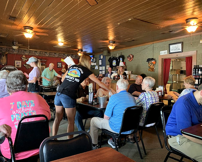 Empty tables that won't stay that way for long. The simple setup might not win design awards, but it's the perfect canvas for the culinary masterpieces about to arrive.