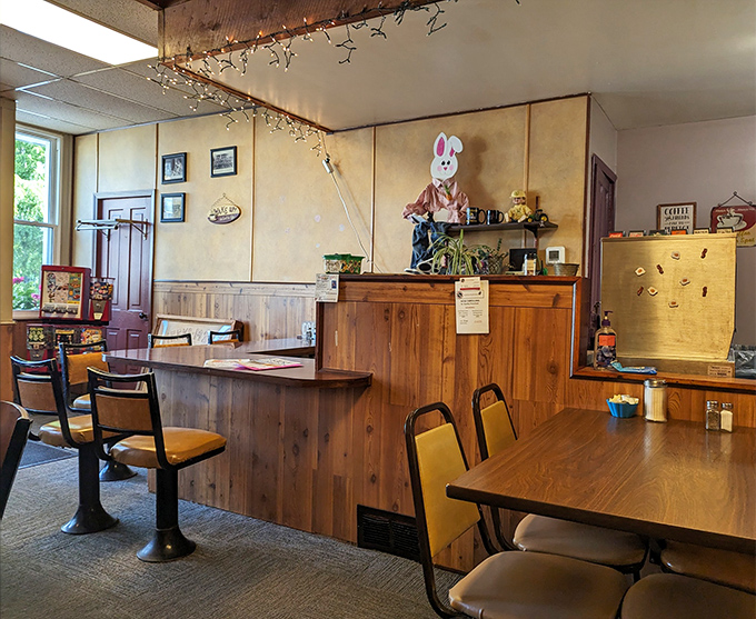 The dining area's unpretentious charm invites you to settle in and stay awhile. Notice the sign: "Bacon makes everything better." Truer words were never spoken.
