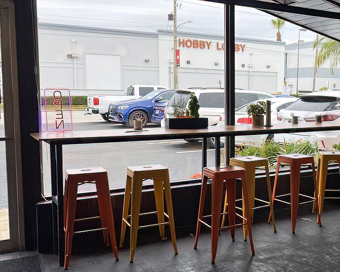 The window counter seating offers prime people-watching real estate while you contemplate your next donut-based life decision.