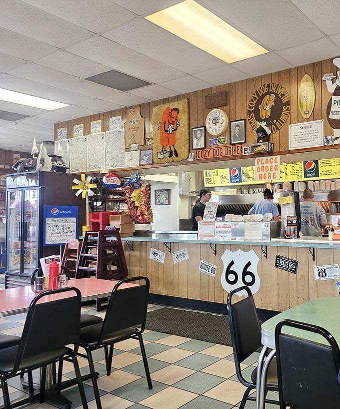 Where wood paneling meets road trip nostalgia. The counter where countless travelers have discovered that happiness is corn-battered.