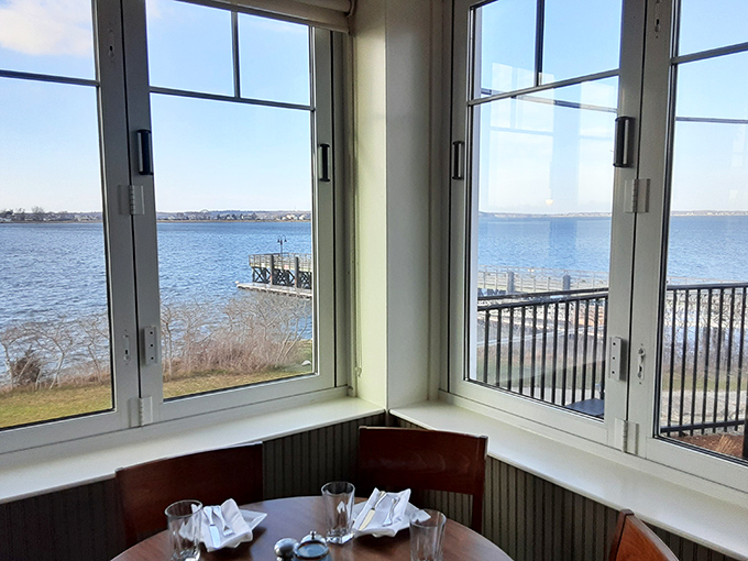 Corner table with a water view that makes business meetings more productive and first dates more successful. Window seat lottery: won.