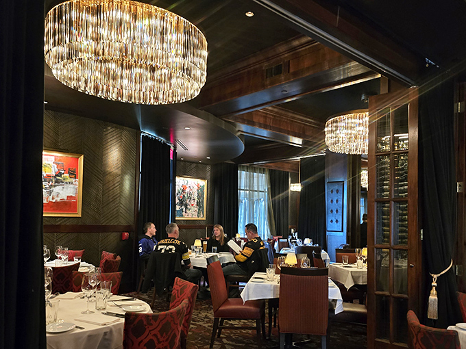 Elegant dining spaces with crystal chandeliers and rich textures create the perfect backdrop for life's celebrations, both planned and spontaneous.