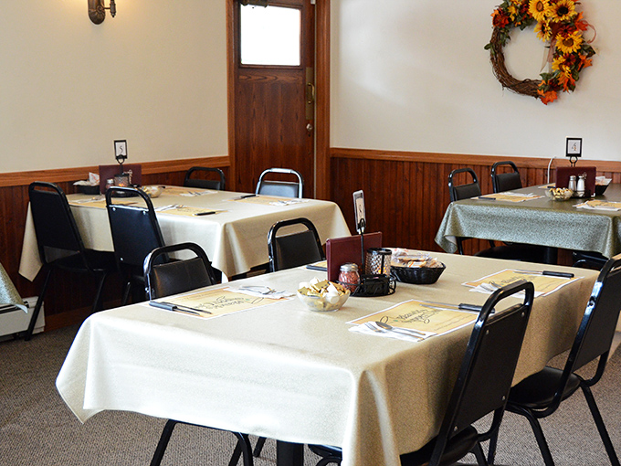 White tablecloths and wood-paneled walls create that perfect supper club atmosphere where time slows down and conversations matter more than cell service.