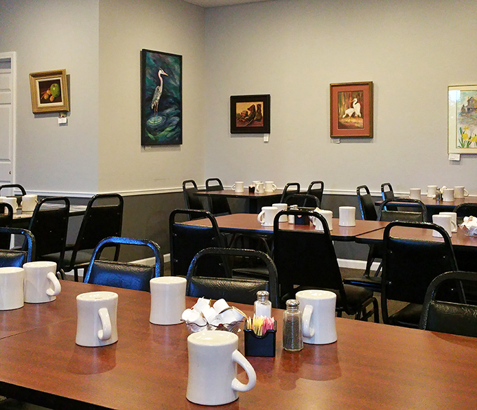 Simple tables, white mugs, and artwork that celebrates nature&mdash;RJ's dining room invites you to slow down and savor the moment.