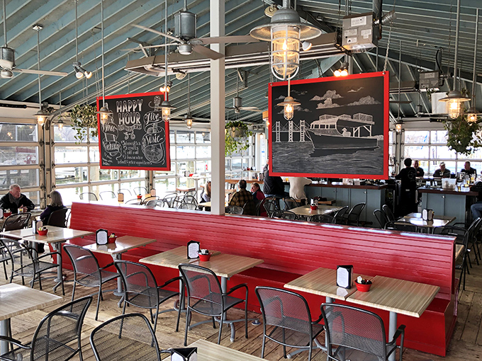 Window seats that frame the marina like living paintings. Each table offers front-row tickets to nature's best waterfront show.