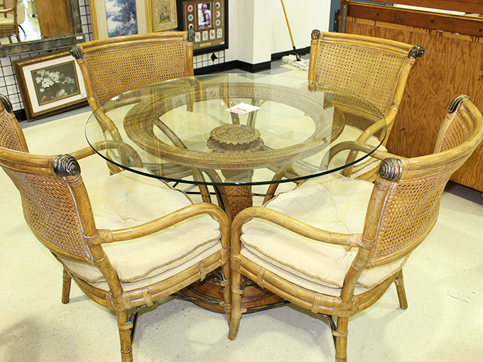 This elegant rattan dining set with glass top screams "Florida sunroom"&mdash;just add mimosas, friends, and conversations that stretch into afternoon.