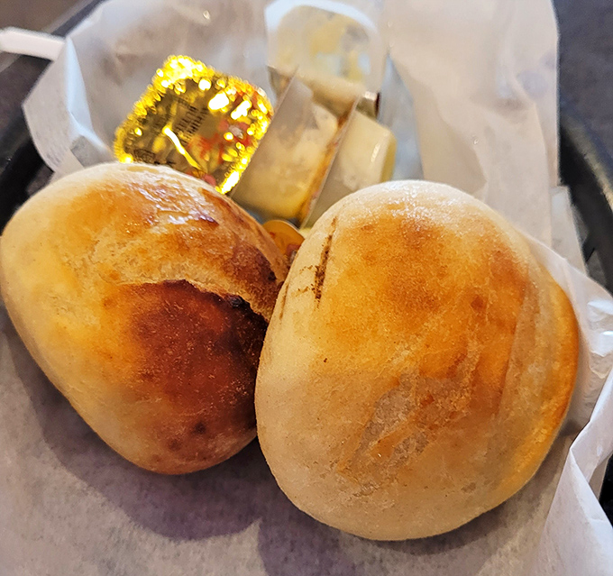 Fresh dinner rolls that make you question why bread baskets ever disappeared from restaurants. Simple pleasures wrapped in golden-brown perfection.