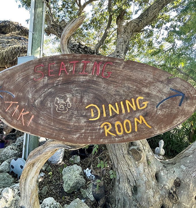 This rustic wooden sign points the way to happiness &ndash; follow its directions and your stomach will thank you profusely.
