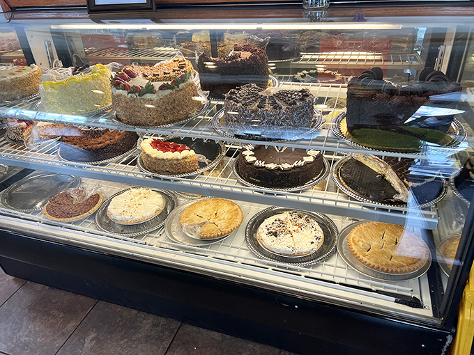 The dessert case – where willpower goes to die and "I'll just have a bite" becomes a beautiful lie.