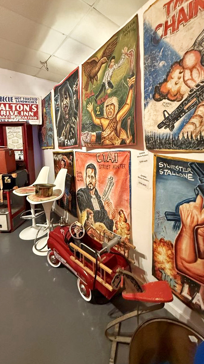 Vintage carnival banners and a fire-engine red pedal car create a corner that's equal parts Americana and sideshow spectacular.