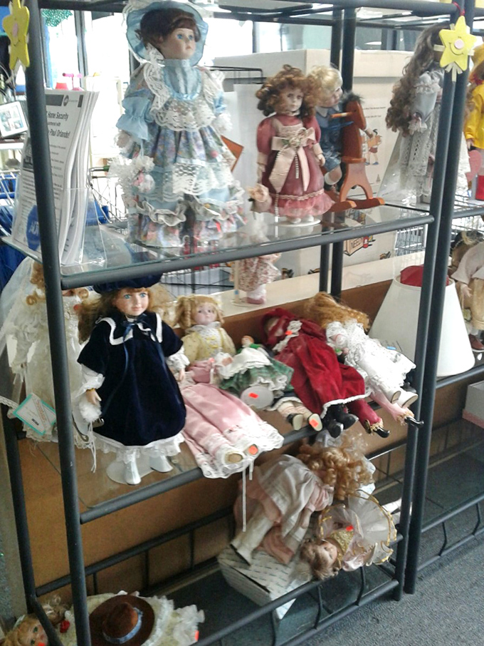 Victorian dolls keeping watch over their domain, possibly plotting their escape to loving homes.