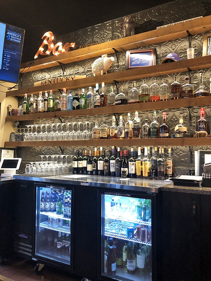 The wall of spirits that makes you realize why Kentucky is famous for more than just horses. That "Bar" sign isn't kidding around.