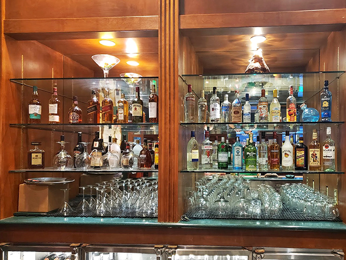 Behind glass doors waits a carefully curated collection of spirits&mdash;liquid companions to the culinary journey that awaits your taste buds.