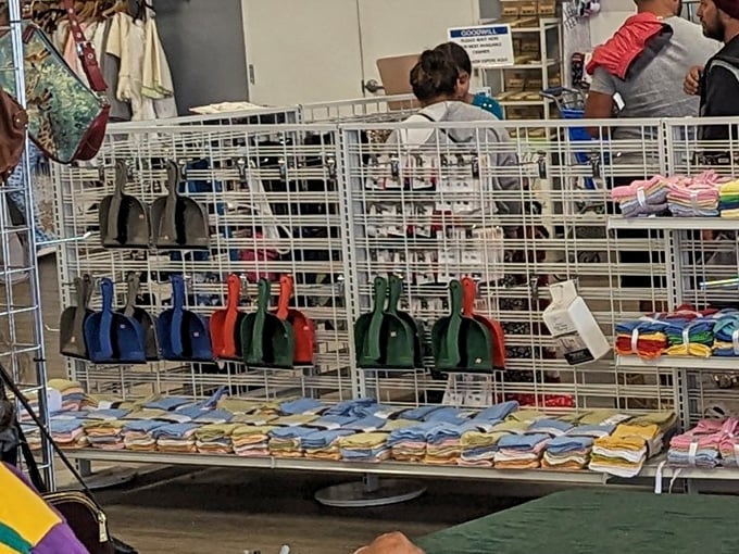 Dustpans in primary colors stand at attention, ready for their next cleaning adventure. Even chores deserve a splash of personality.